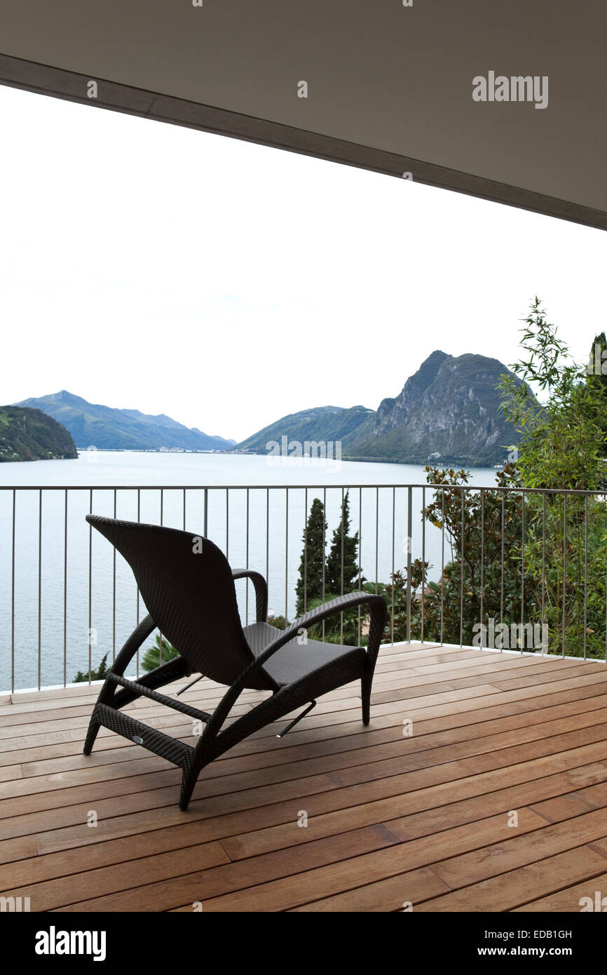 Modern house, balcony overlooking the lake Stock Photo - Alamy