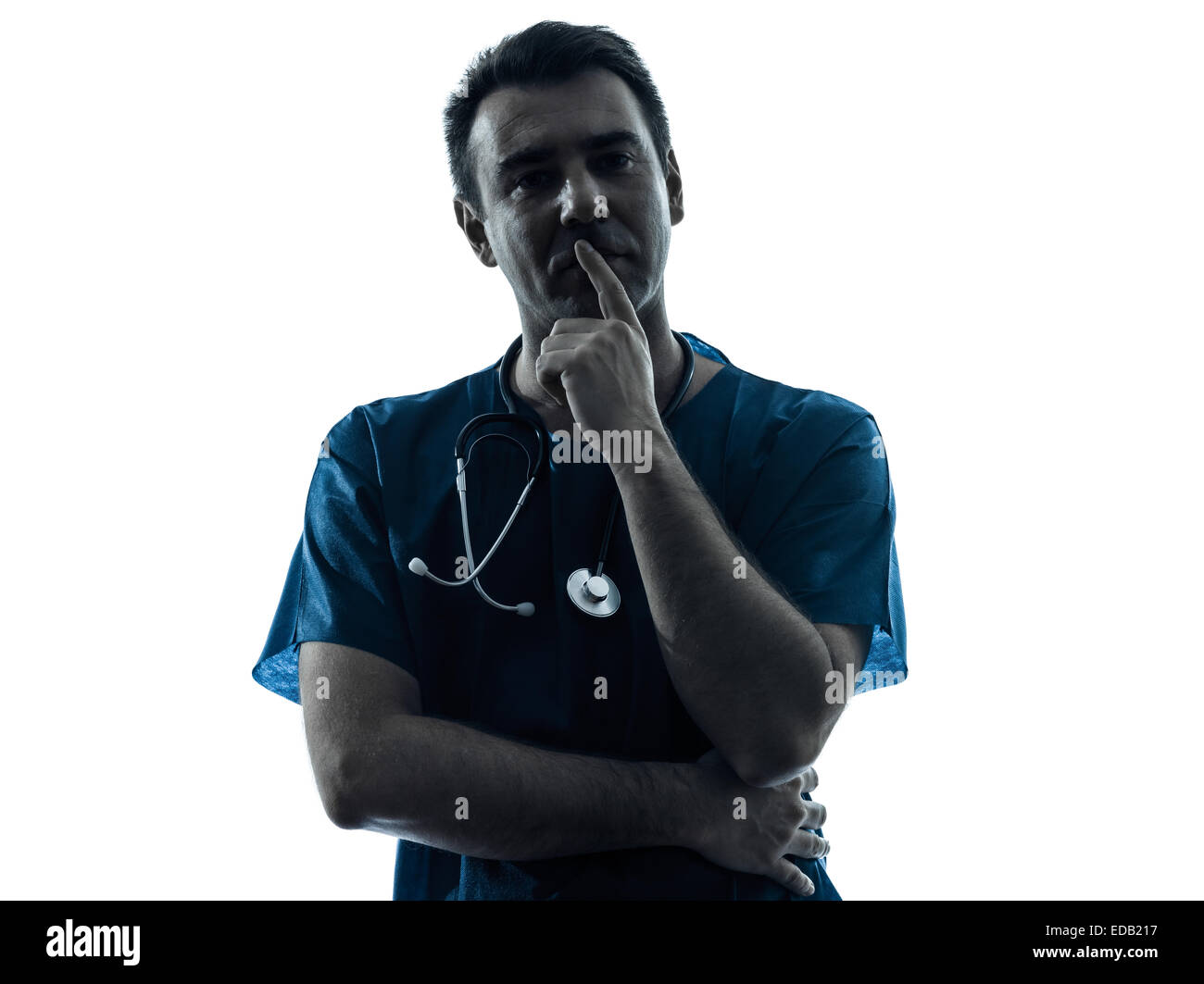 one man doctor surgeon medical worker thinking pensive silhouette ...