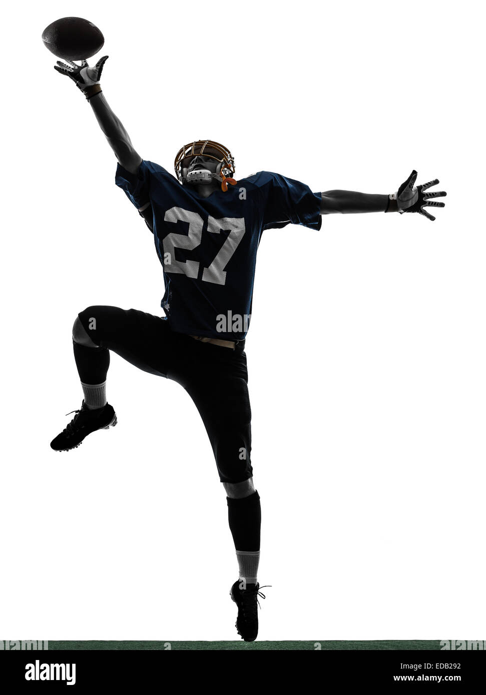 one american football player man catching receiving in silhouette ...