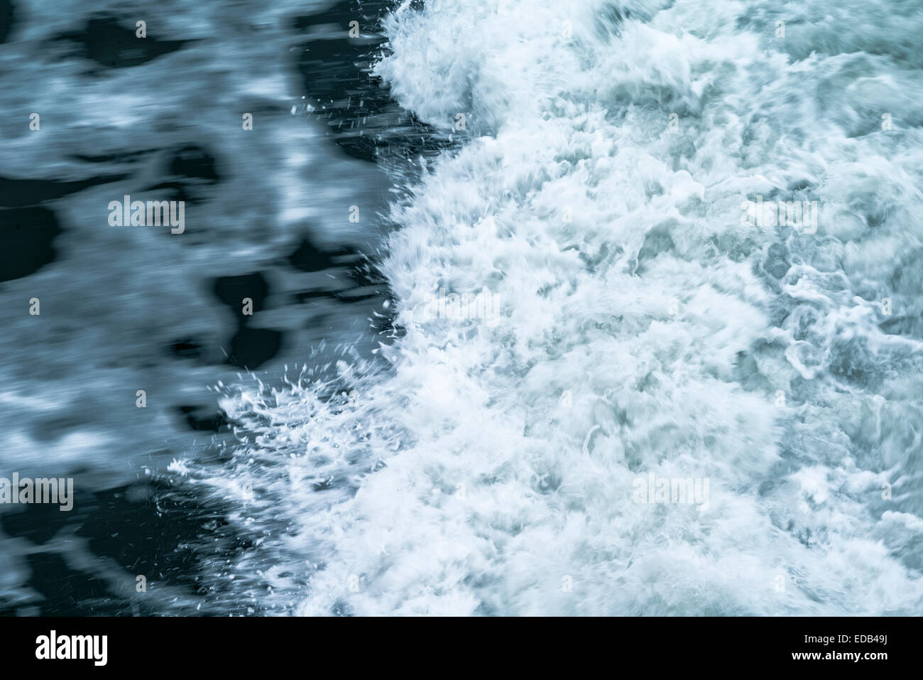 Image of waves crashing on the shore creating abstract patterns Stock ...
