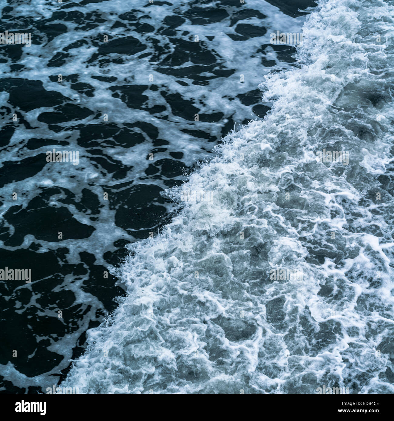 image of waves creating abstract patterns as they break on the shore ...