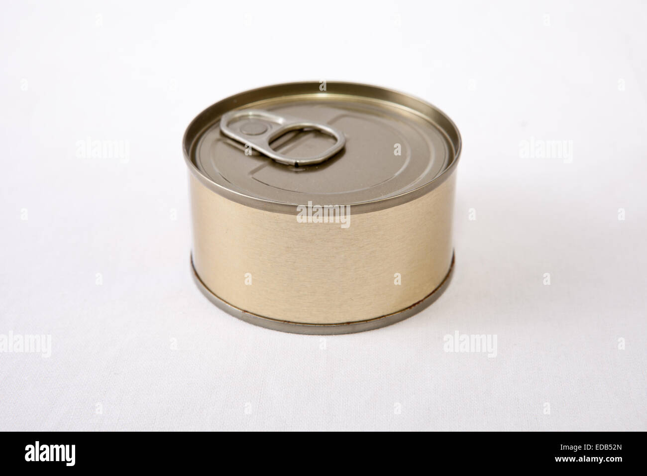 Closed Circular tin can isolated over white background. Selective focus ...