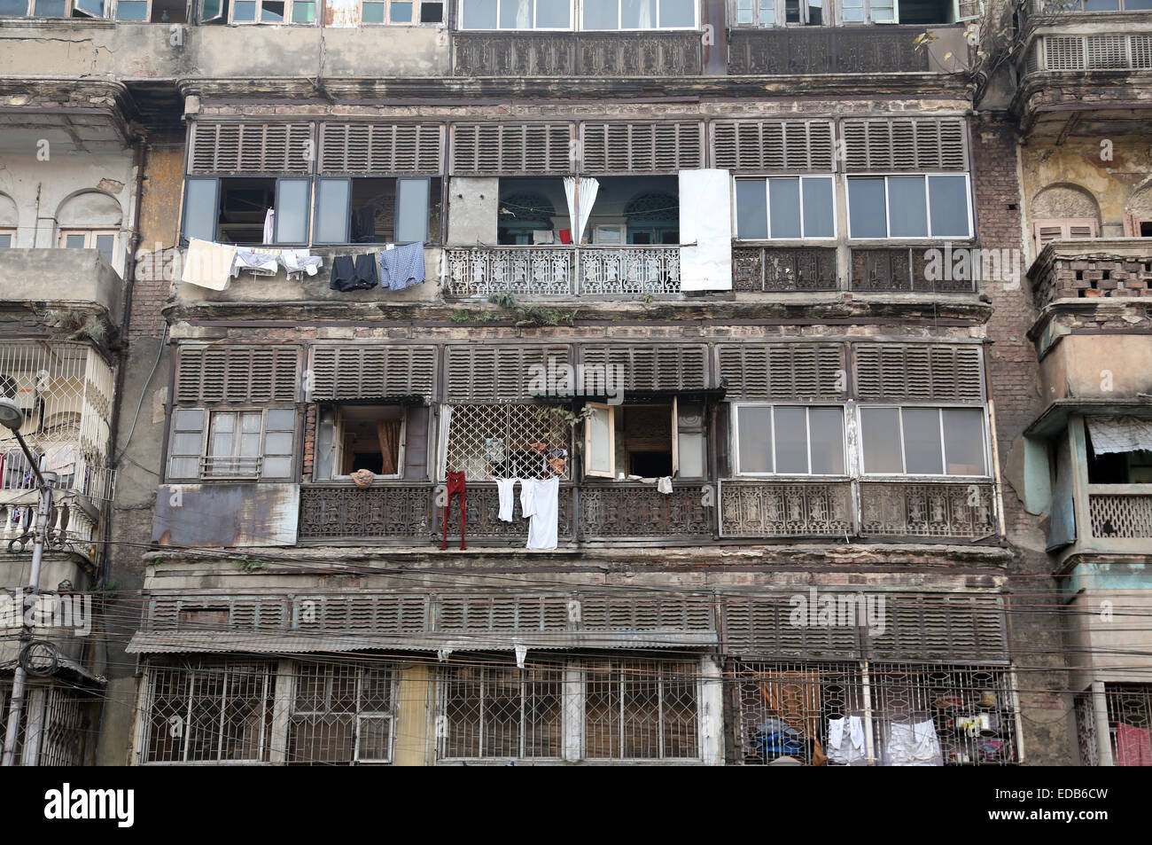 An aging, decaying, ex-colonial tenement block in Kolkata, West Bengal ...