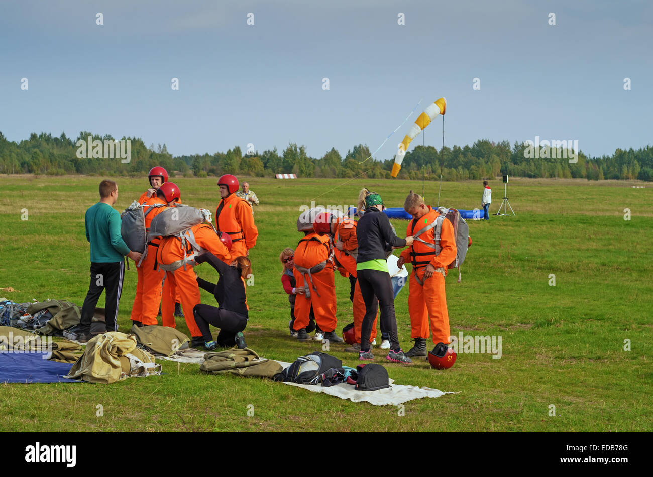 Parachutists - 2014. Check of parachutes before jumps Stock Photo - Alamy