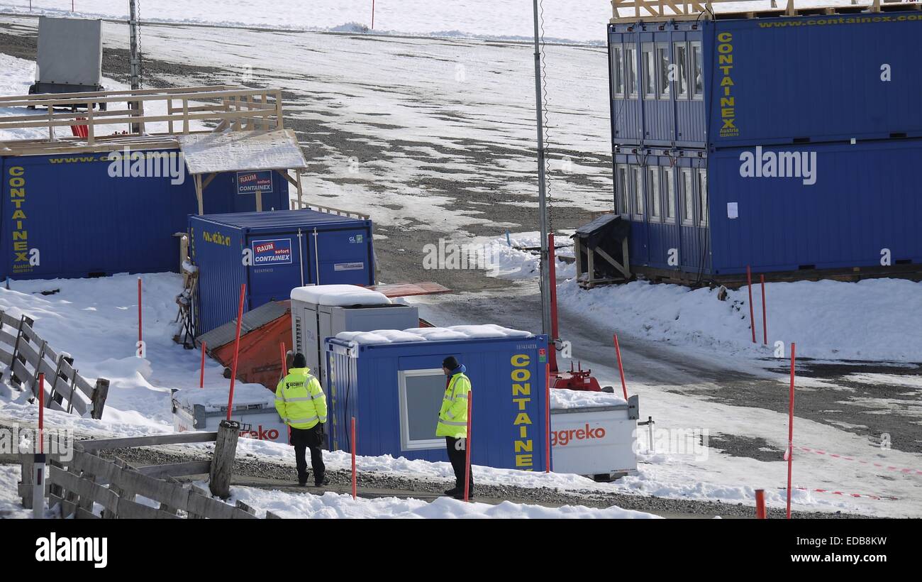 Obertilliach, Austria. 14th Dec, 2014. Security guards stand in front ...