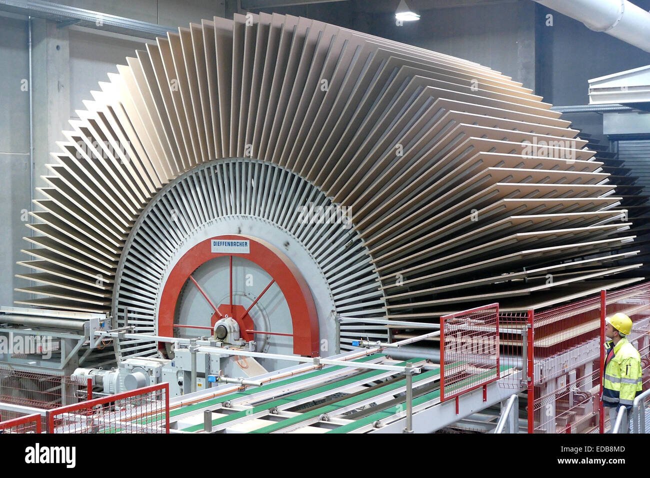 Chipboard plates are produced at the wood processing company Pfleiderer ...