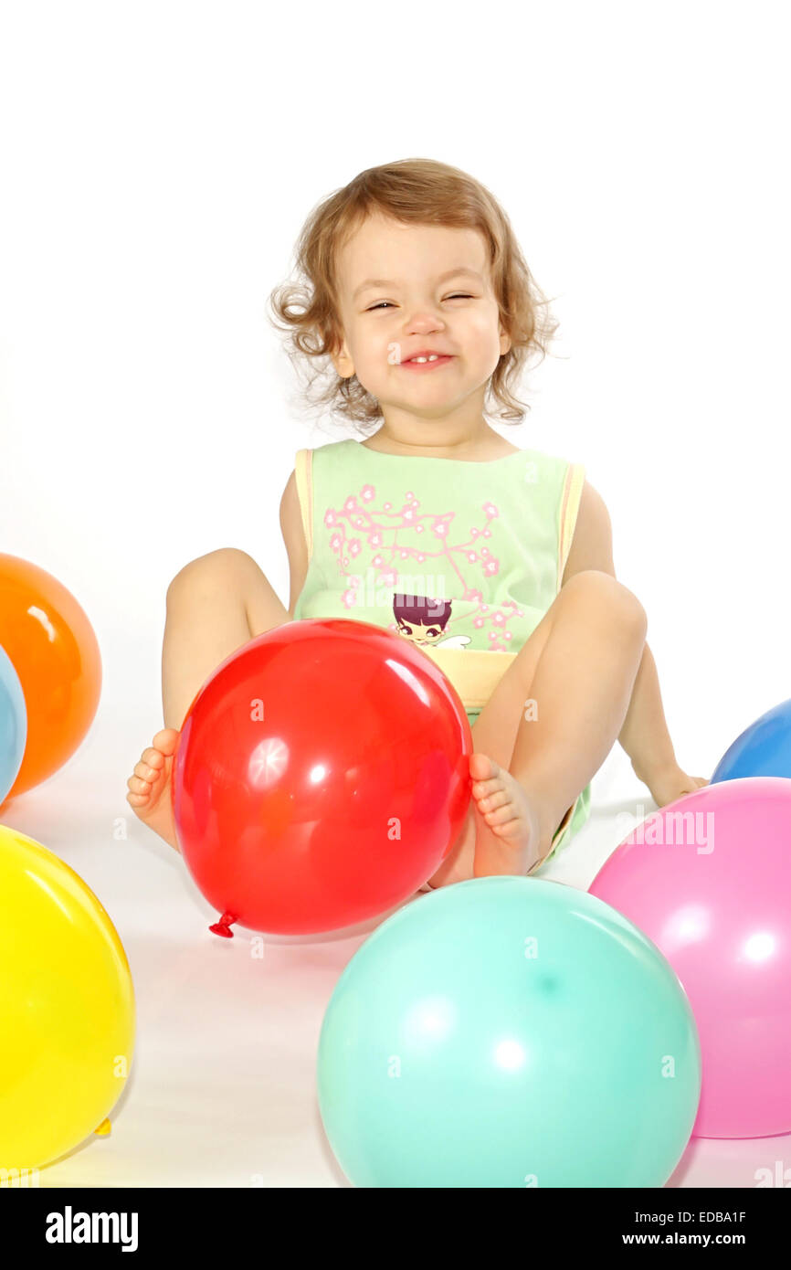 Little girl and balloons Stock Photo - Alamy
