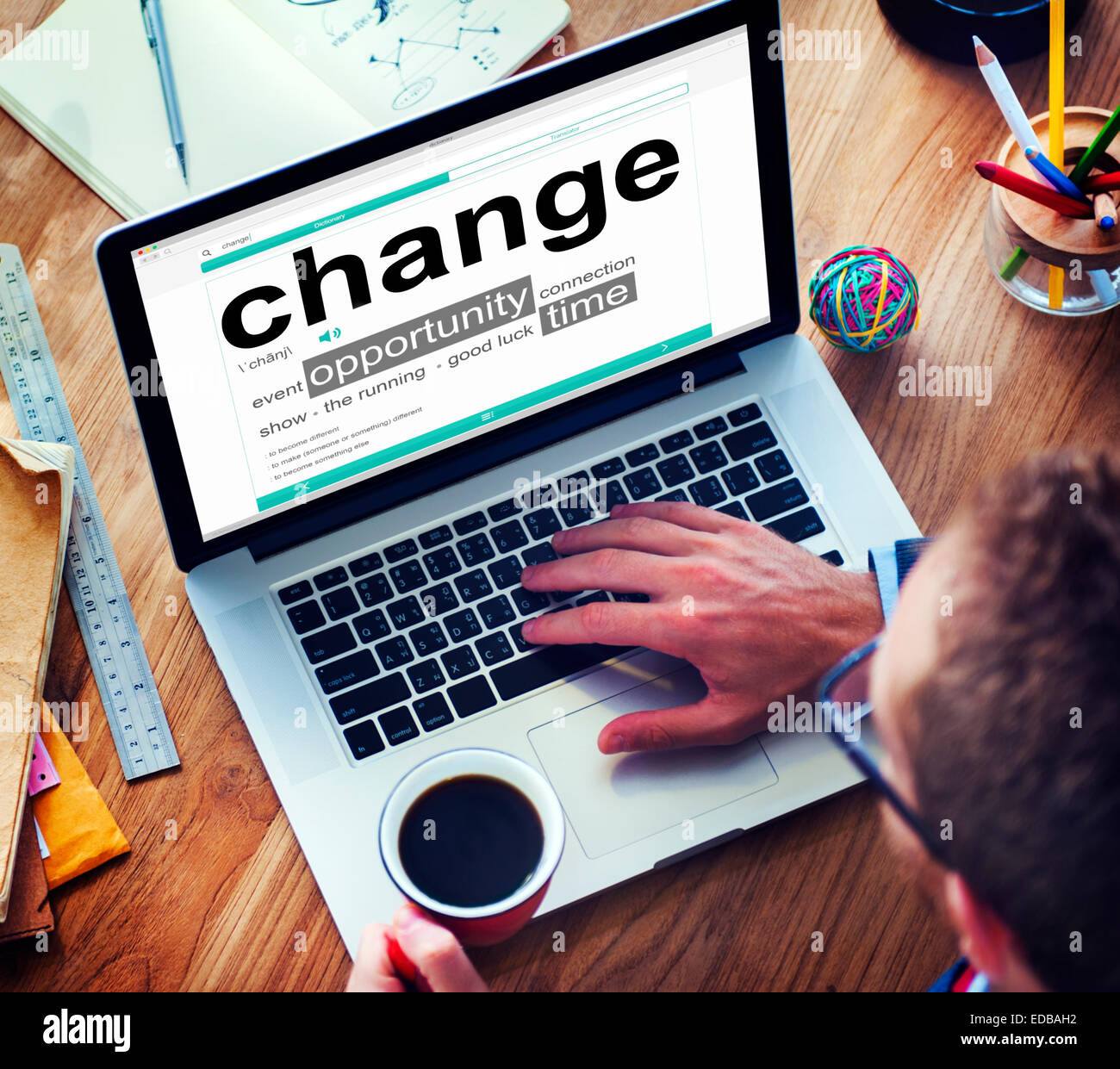Man Reading the Definition of Change Stock Photo - Alamy