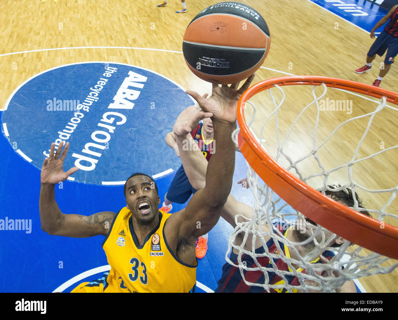 Berlin's Jamel McLean (L) and Barcelona's Ante Tomic (R) fight for the ...