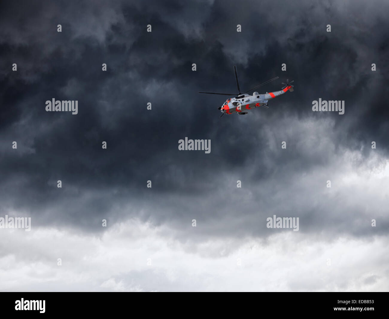 Helicopter in Norway seen from below in front dramatic sky Stock Photo ...