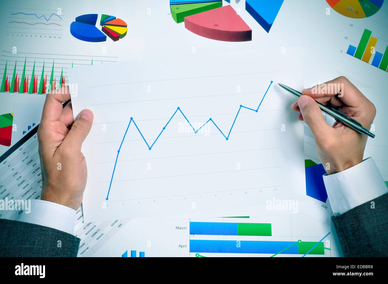 Businessman charts hi-res stock photography and images - Alamy