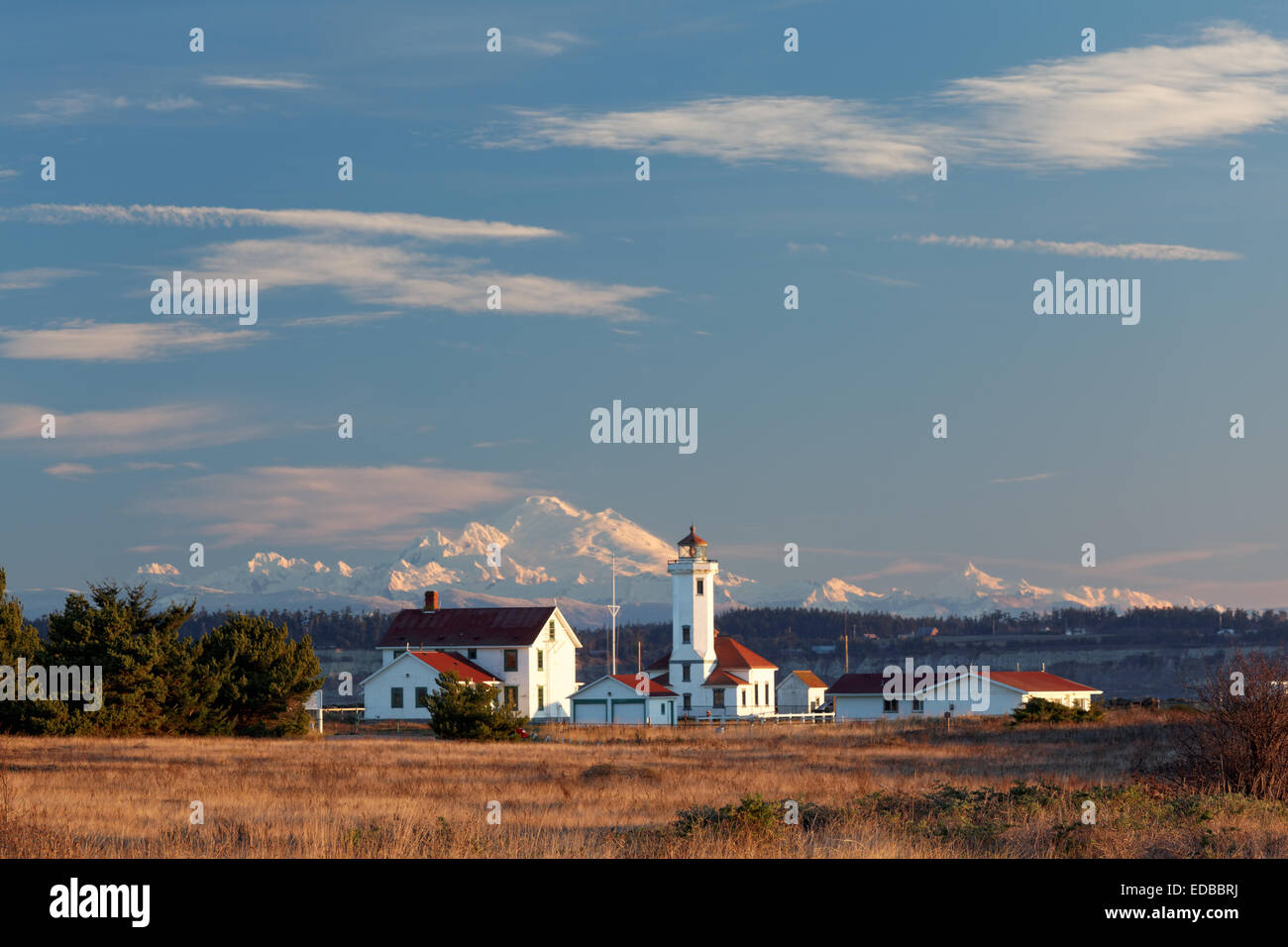 Point Wilson Lighthouse and snowy Mount Baker at sunrise, Fort Warden ...