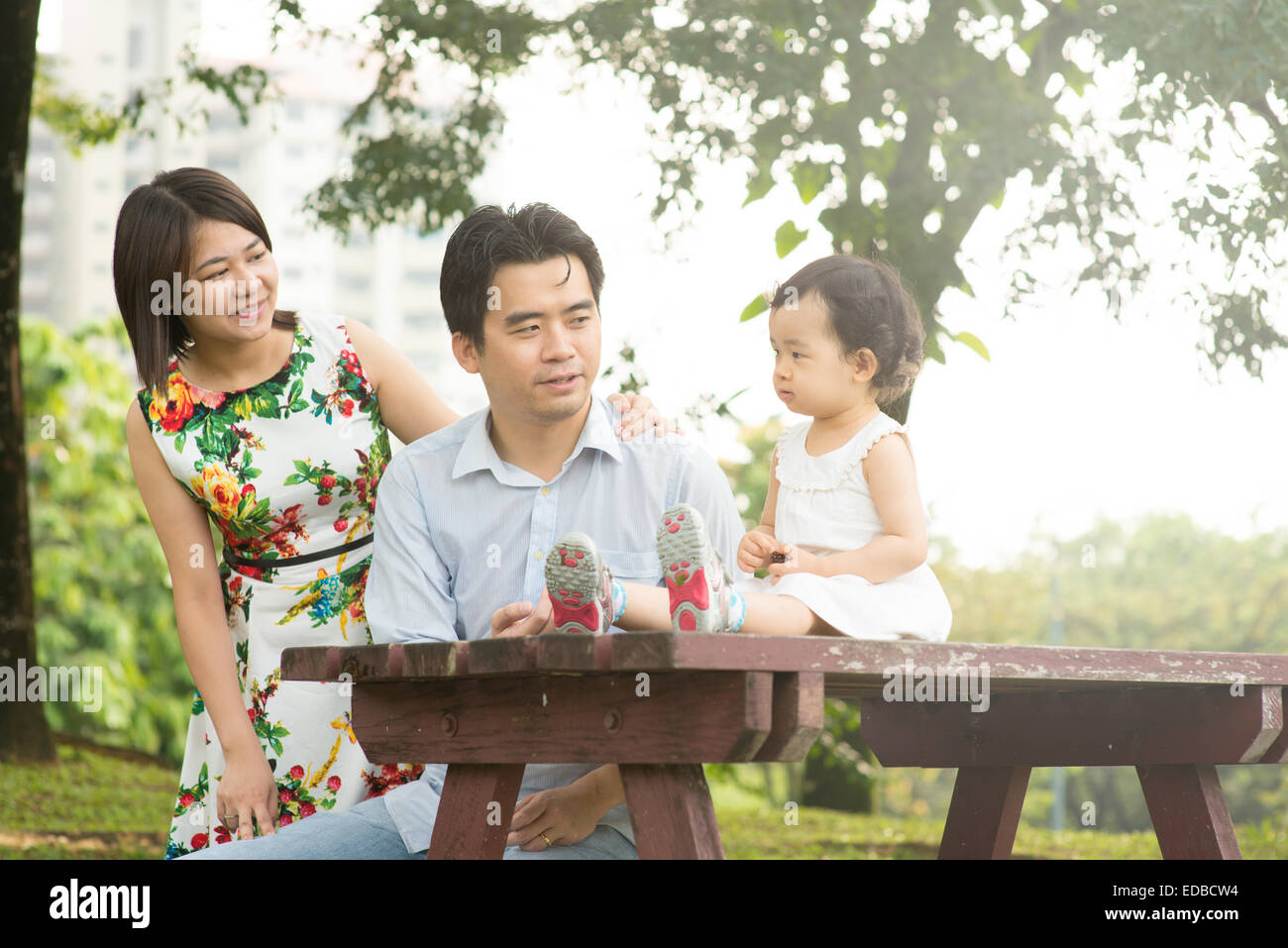 Happy Asian Family enjoying their time in the park Stock Photo - Alamy