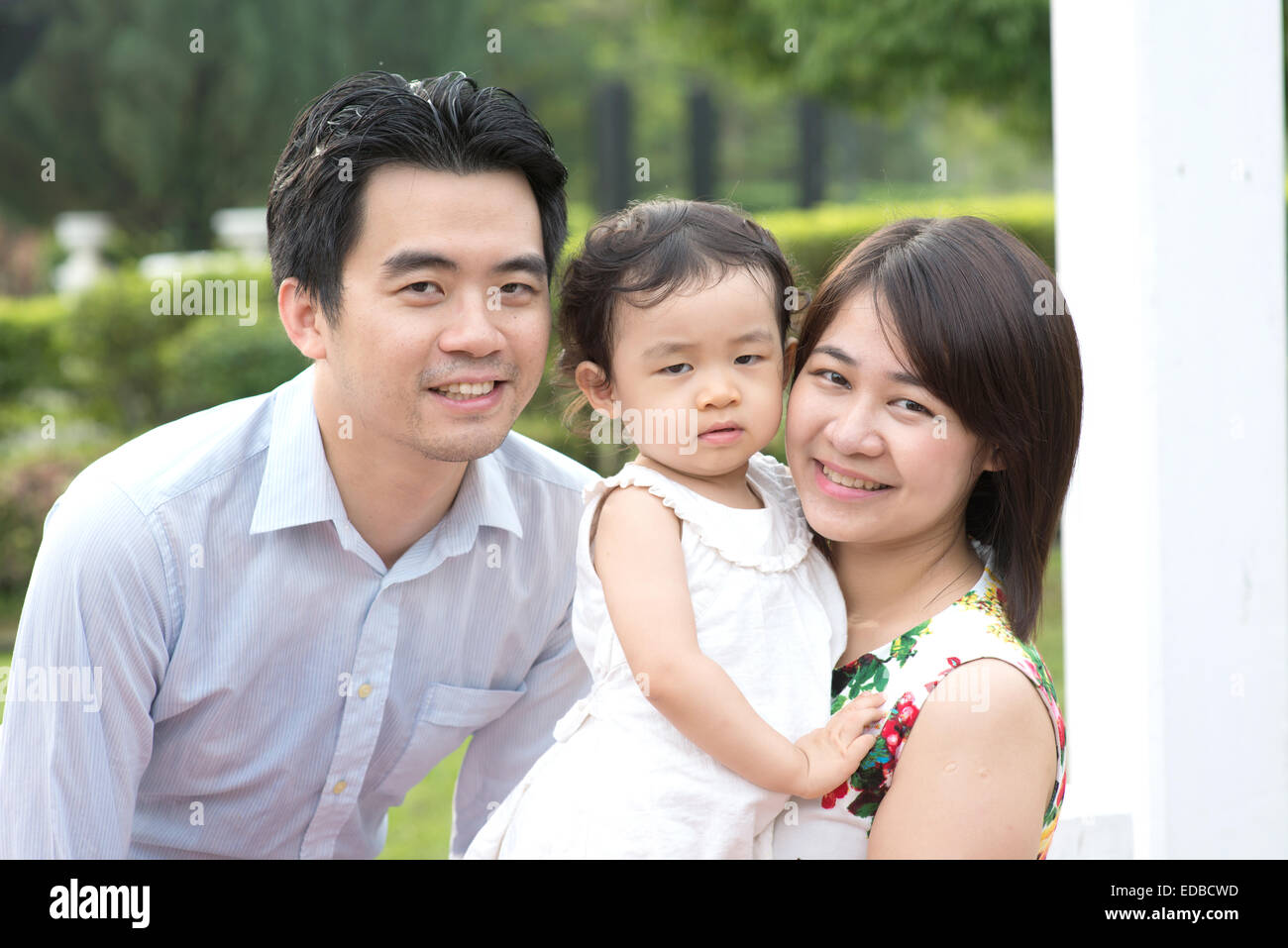 Happy Asian Family enjoying their time in the park Stock Photo - Alamy