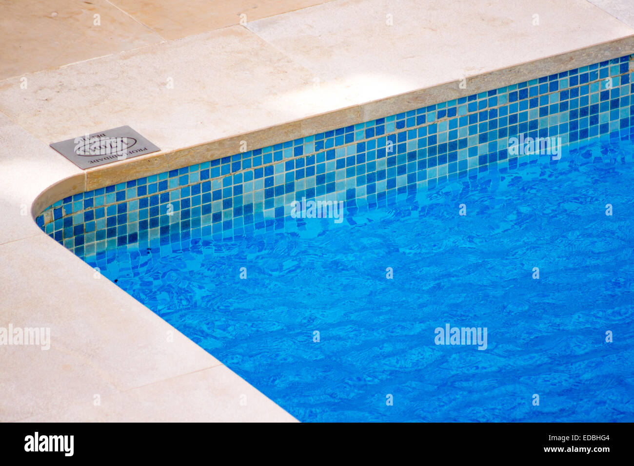 Steps down blue swimming pool hi-res stock photography and images - Alamy
