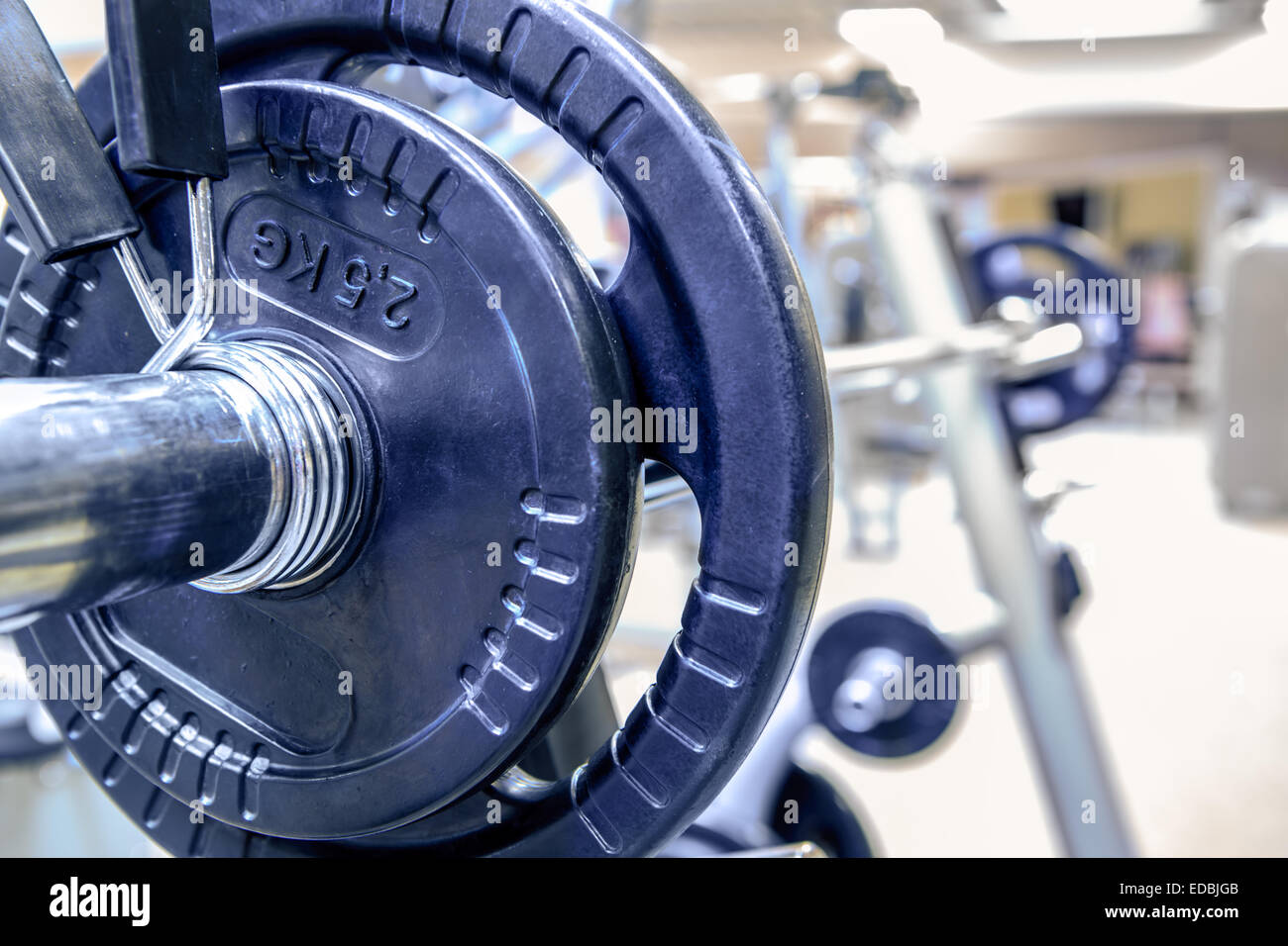 diverse equipment and machines at the gym room Stock Photo - Alamy