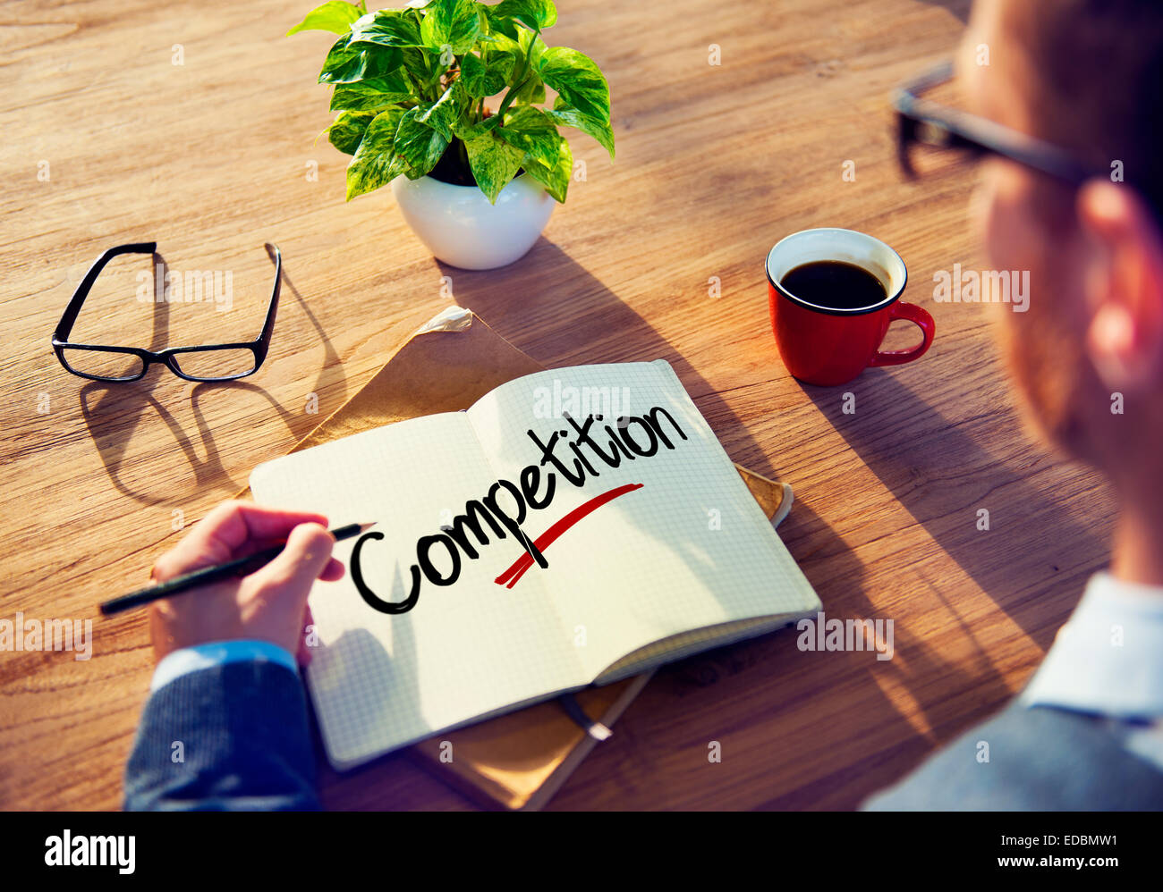 Man with a Note and a Single Word Competition Stock Photo - Alamy