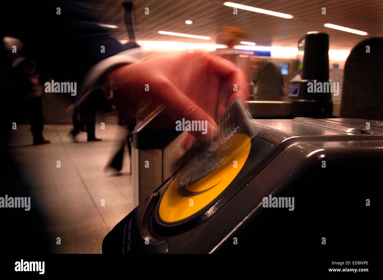 A man using ticket gate underground station hi-res stock photography ...