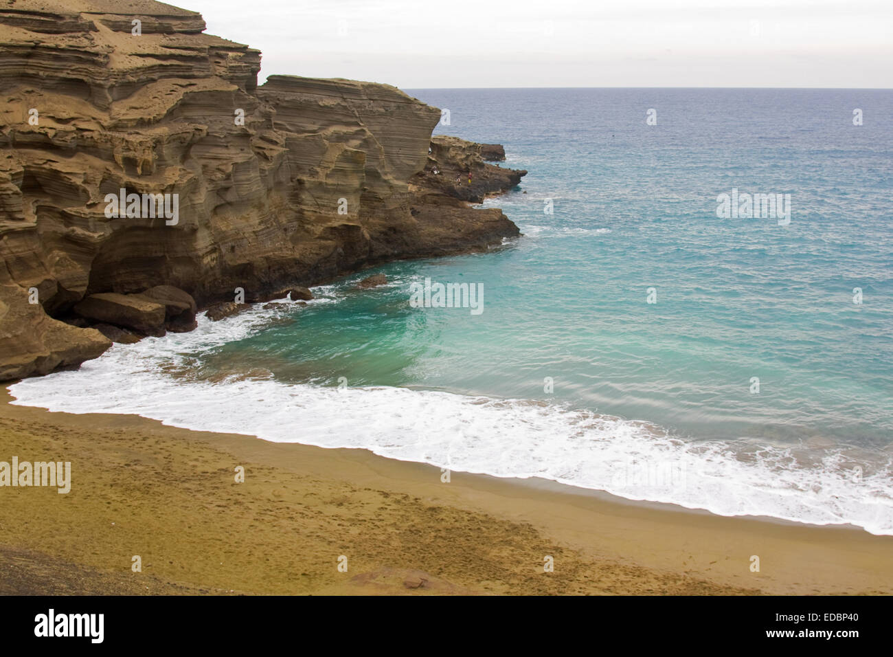 Green Sand Beach (Papakolea Beach) sand is almost exclusively composed ...