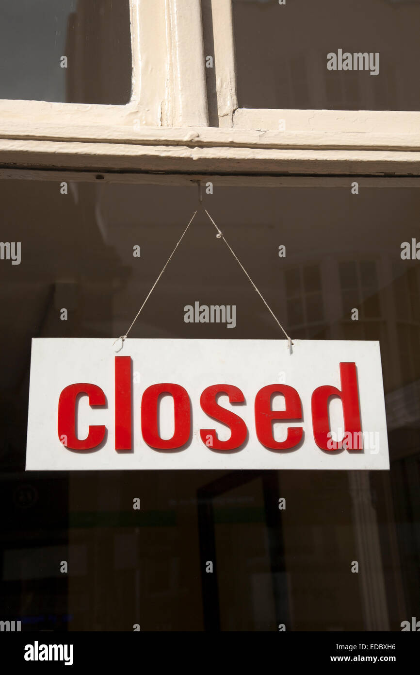 Closed Sign on Shop Window Stock Photo - Alamy