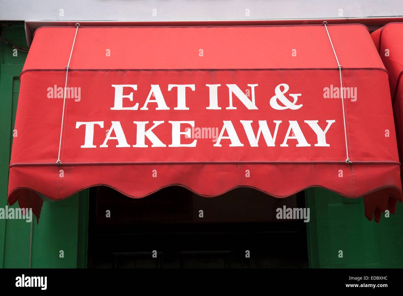 Eat In Or Take Away Sign on Red Background Stock Photo - Alamy