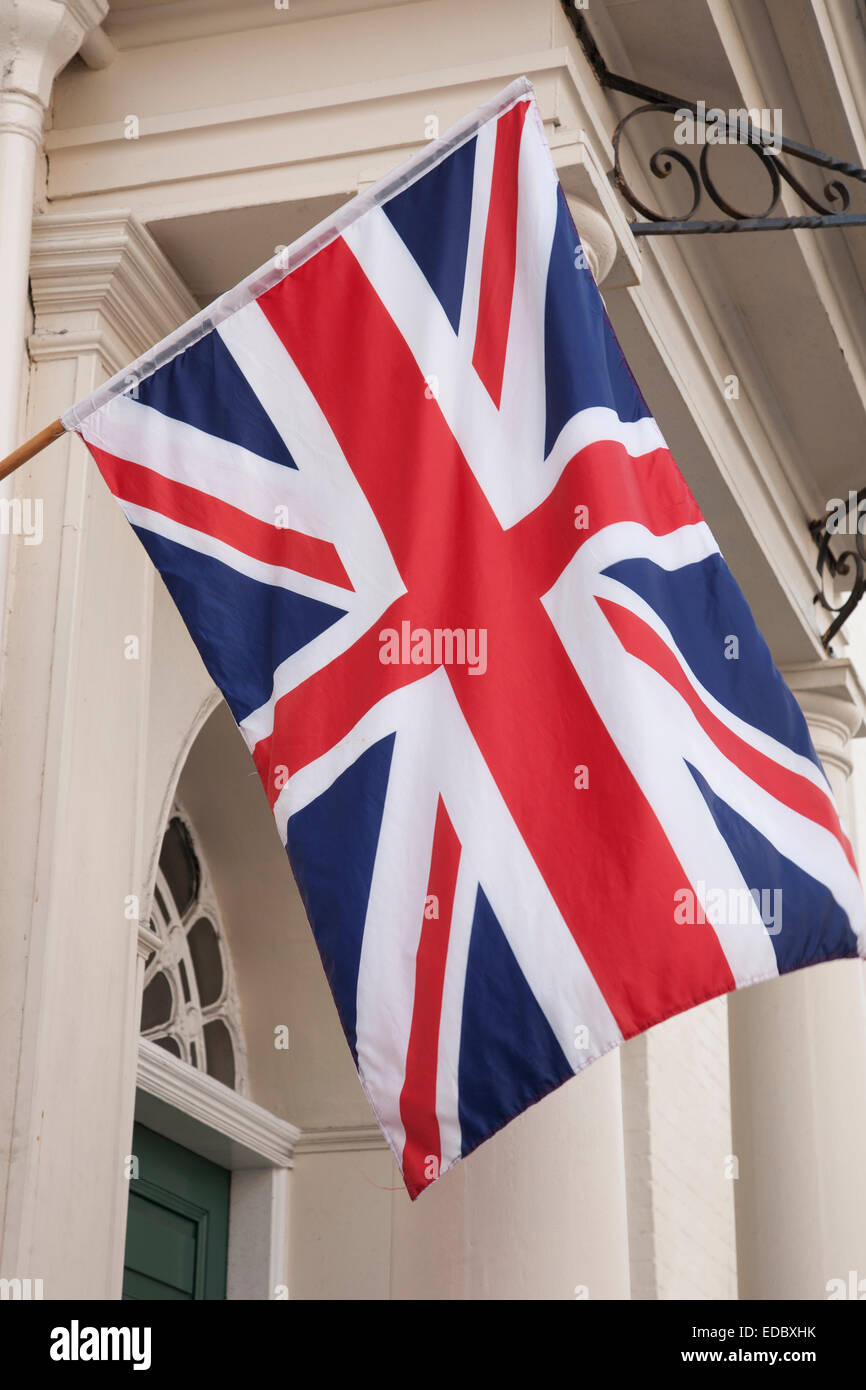 Union Jack Flag against Building Facade Stock Photo - Alamy