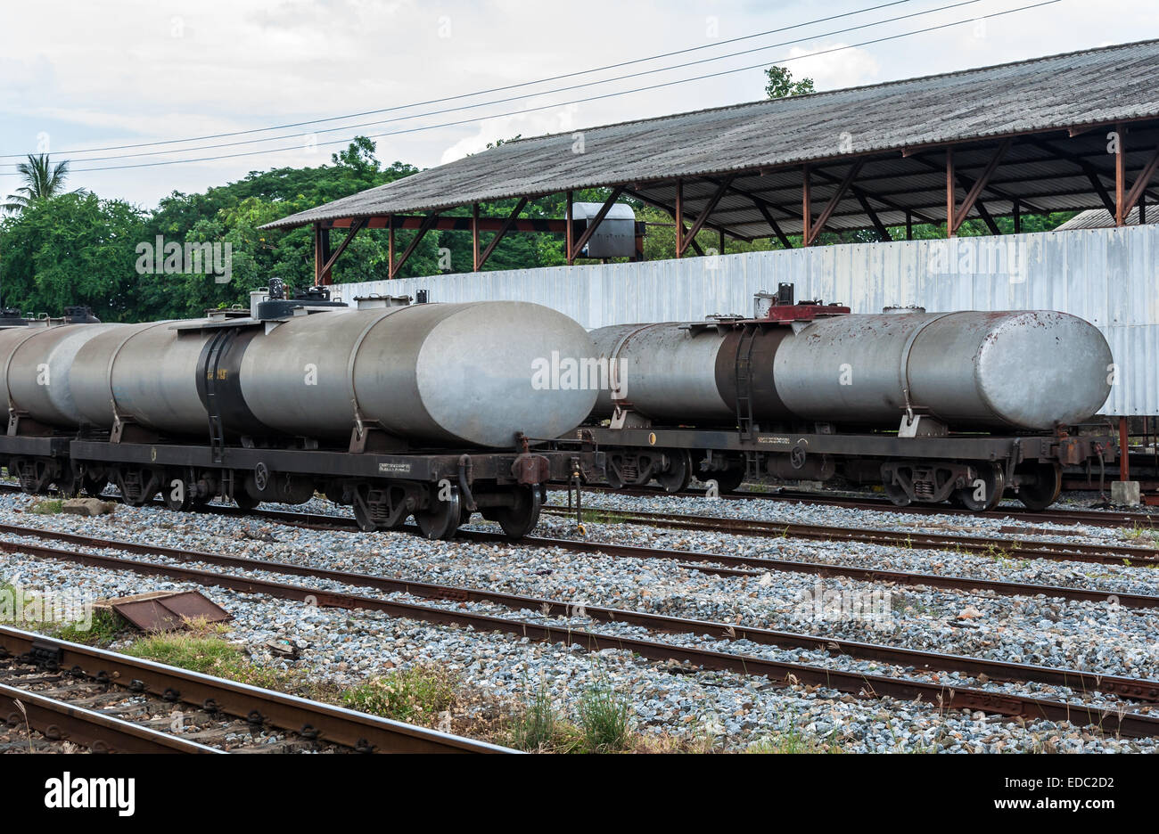 Oil freight train in the yard of large station Stock Photo - Alamy