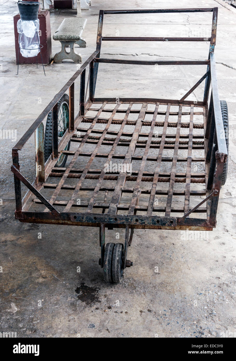 Old dirty cart on the platform of train station Stock Photo - Alamy