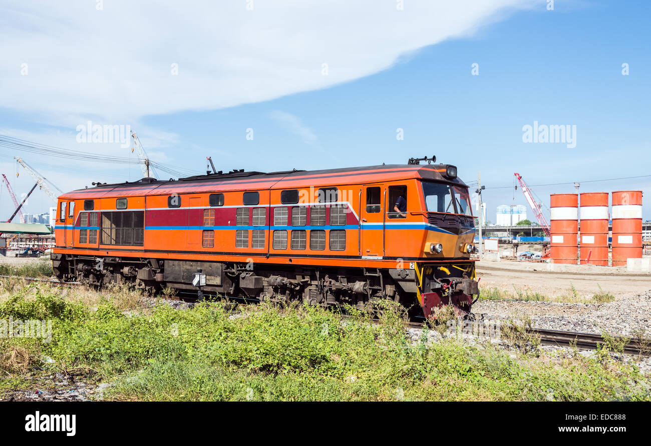 Diesel Electric Locomotive is passing the construction site near ...