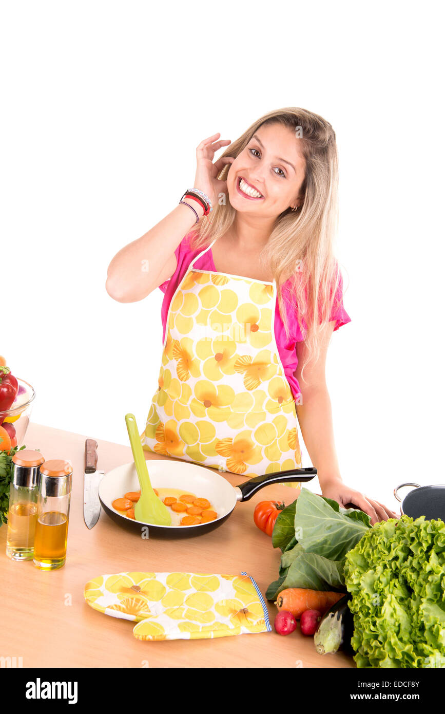 Beautiful woman cooking in the kitchen Stock Photo - Alamy