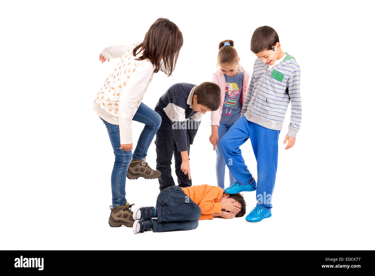 Group of children bullying an isolated child Stock Photo - Alamy
