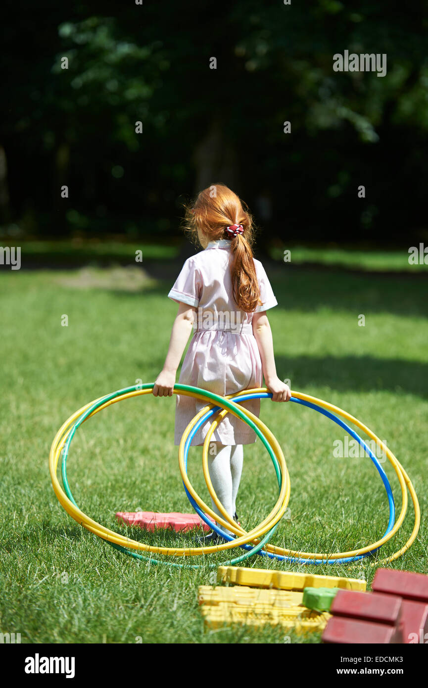 girl with hula hoops Stock Photo - Alamy