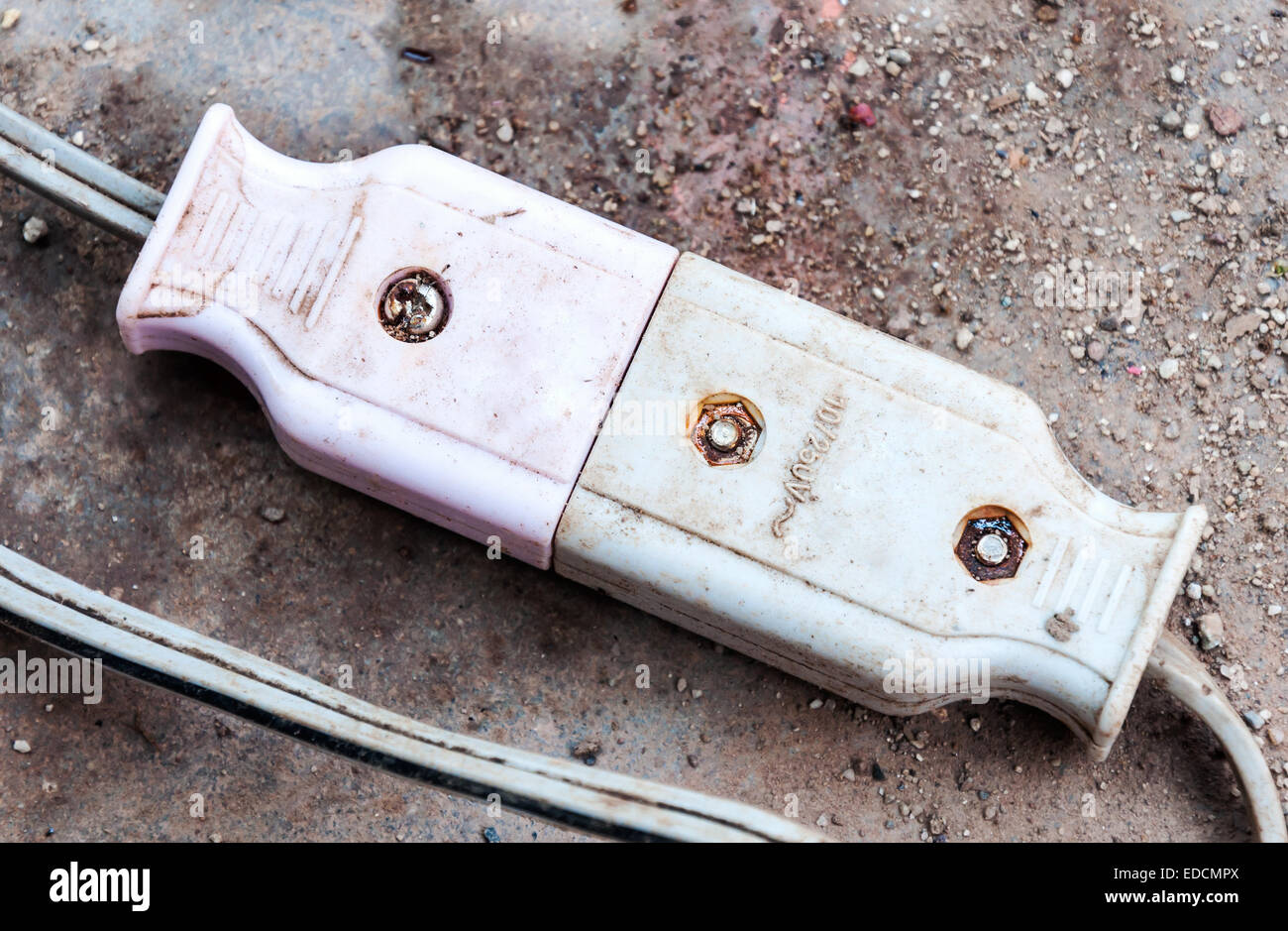 Old electric plug is connect for small house Stock Photo - Alamy