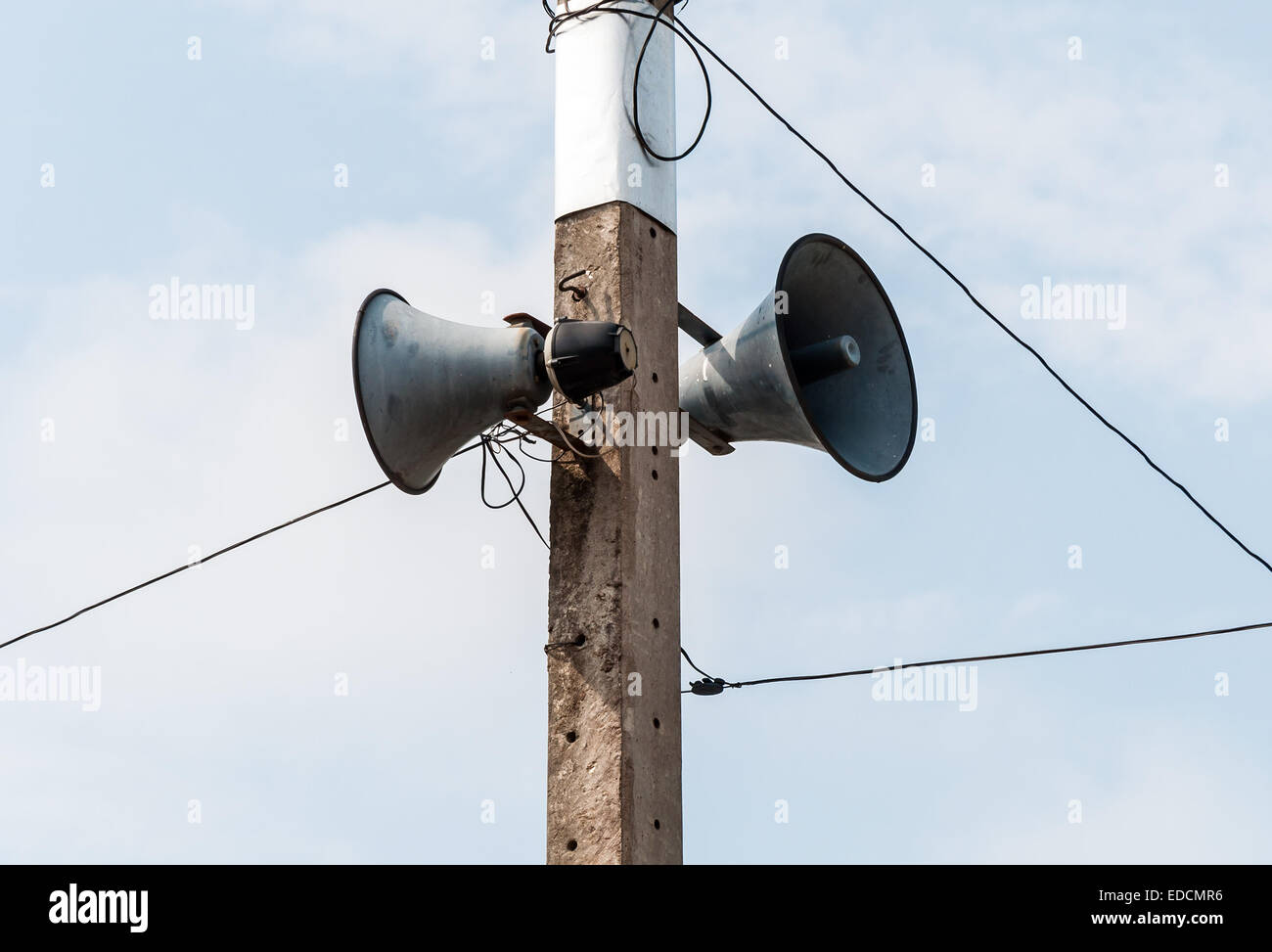 Twin megaphone is hanging on the electricity post Stock Photo - Alamy