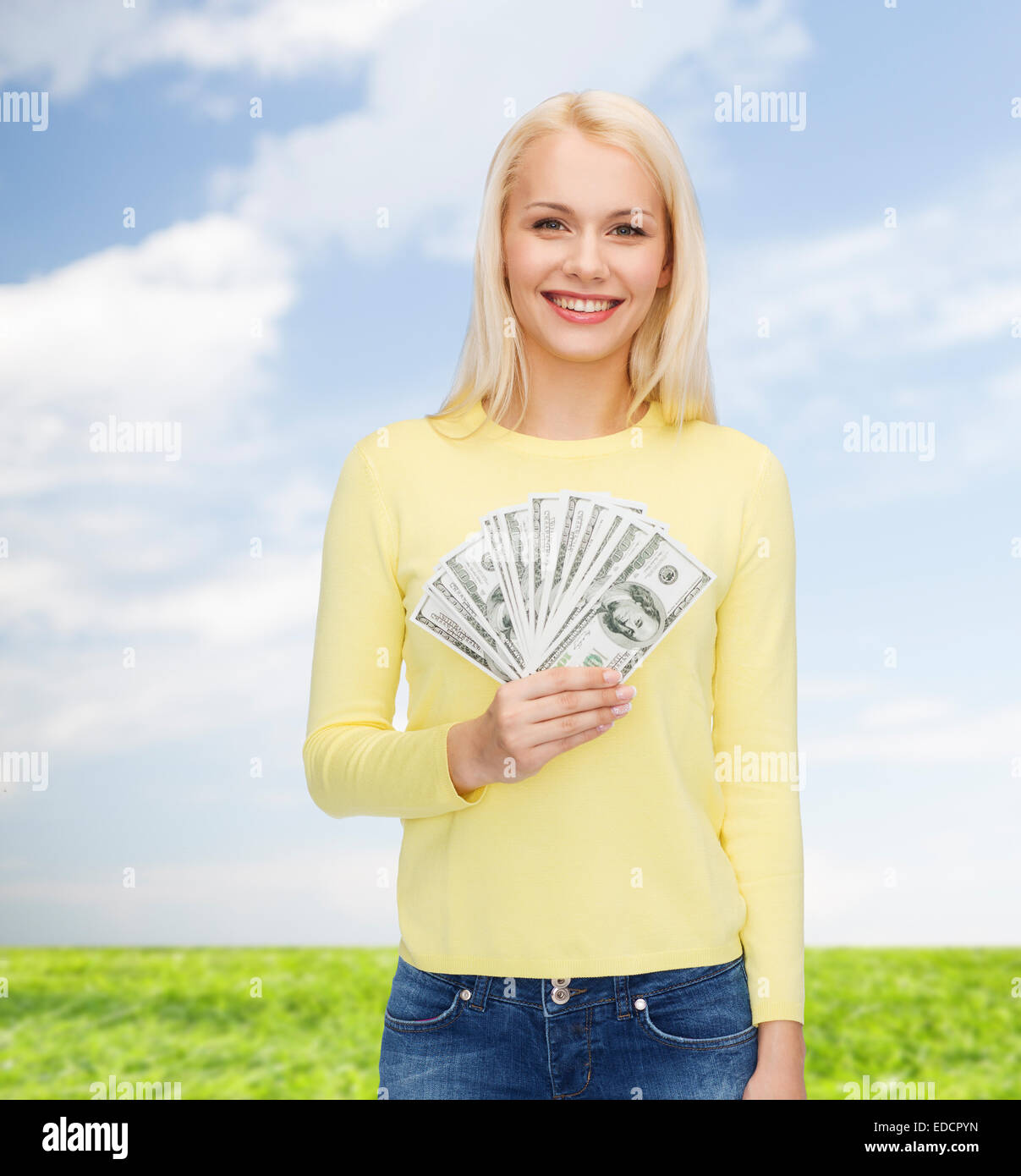 smiling girl with dollar cash money Stock Photo - Alamy