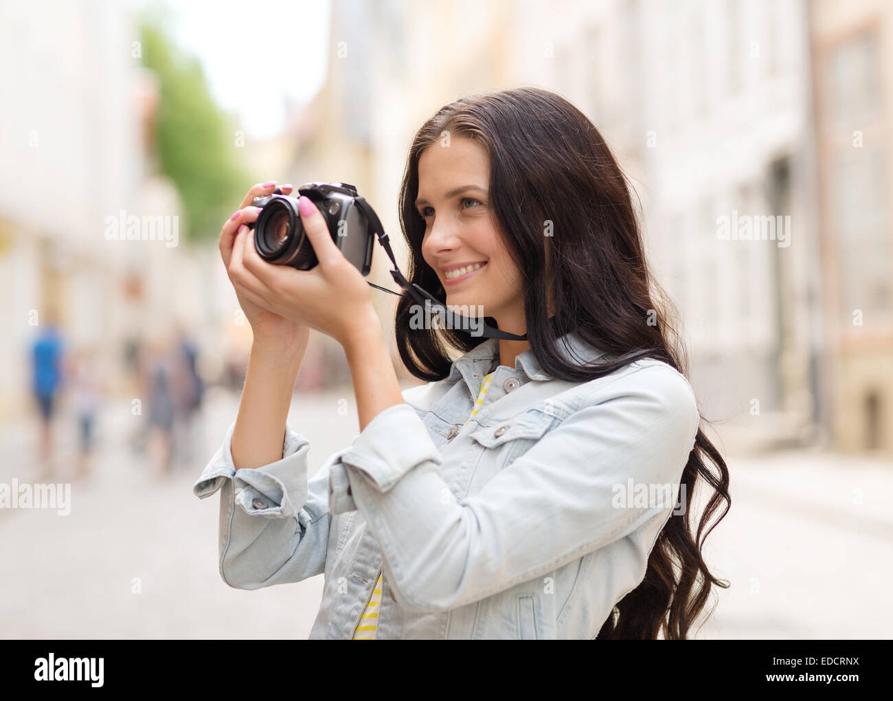 smiling teenage girl with camera Stock Photo - Alamy