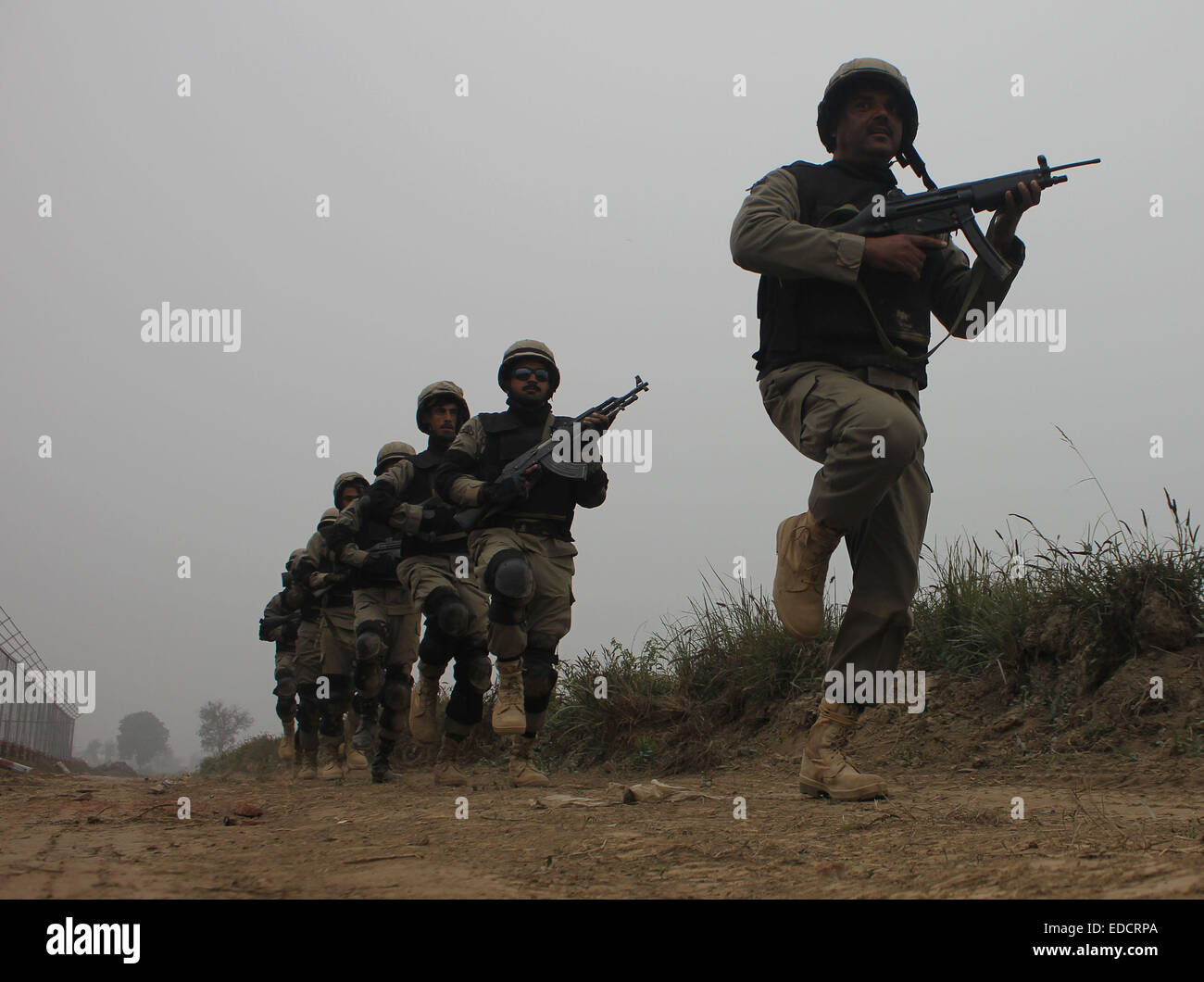 Pakistani Security Force patrol along the Pakistan-India border area of ...