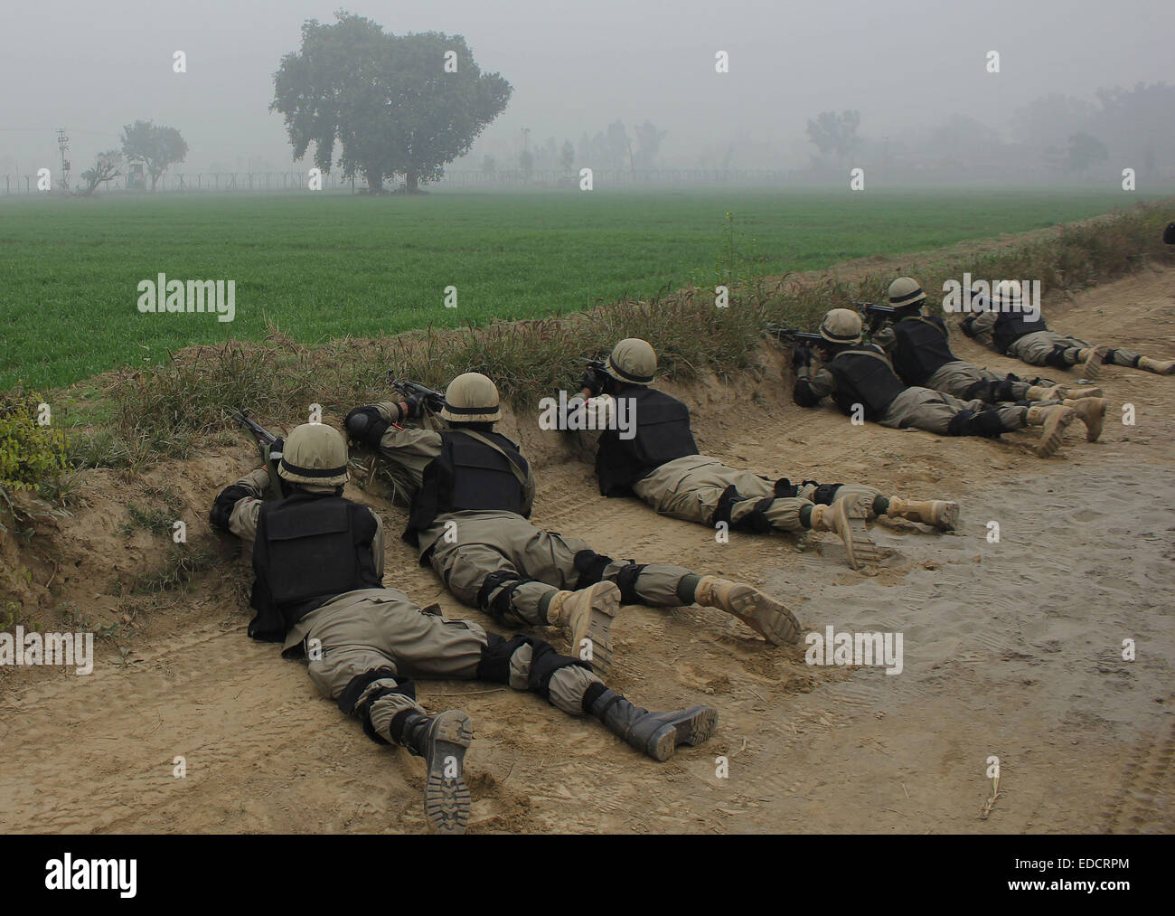 Pakistani Security Force patrol along the Pakistan-India border area of ...