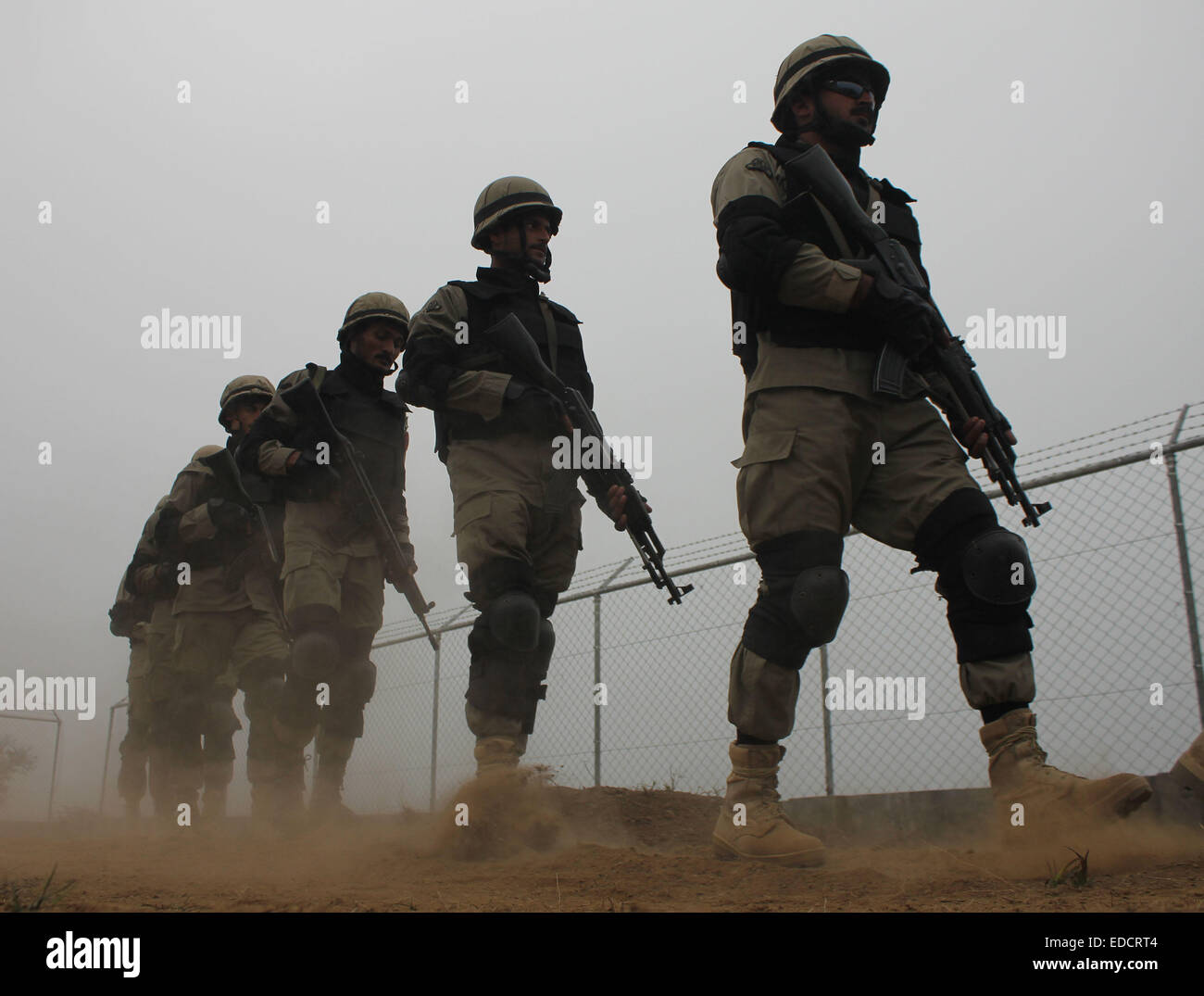 Pakistani Security Force patrol along the Pakistan-India border area of ...