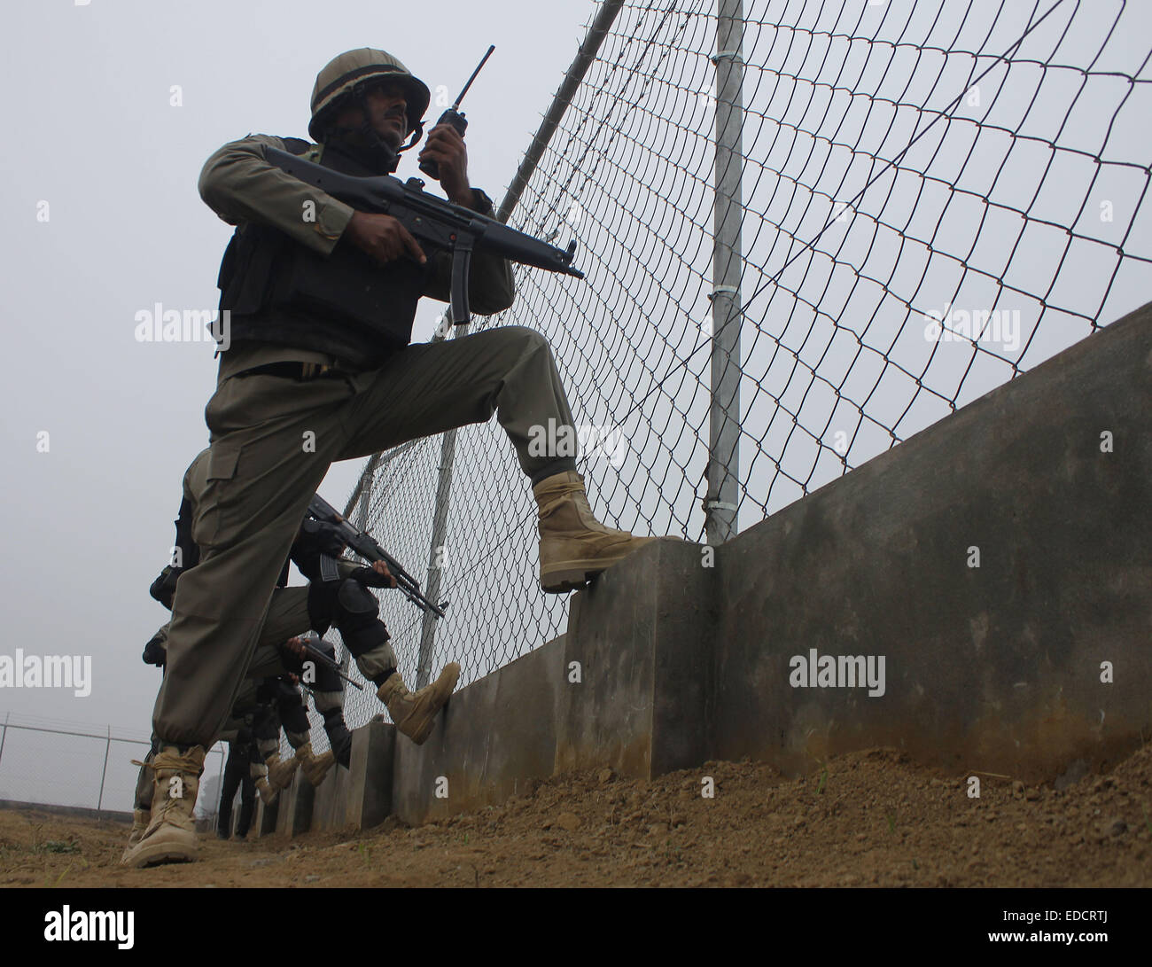 Pakistani Security Force patrol along the Pakistan-India border area of ...