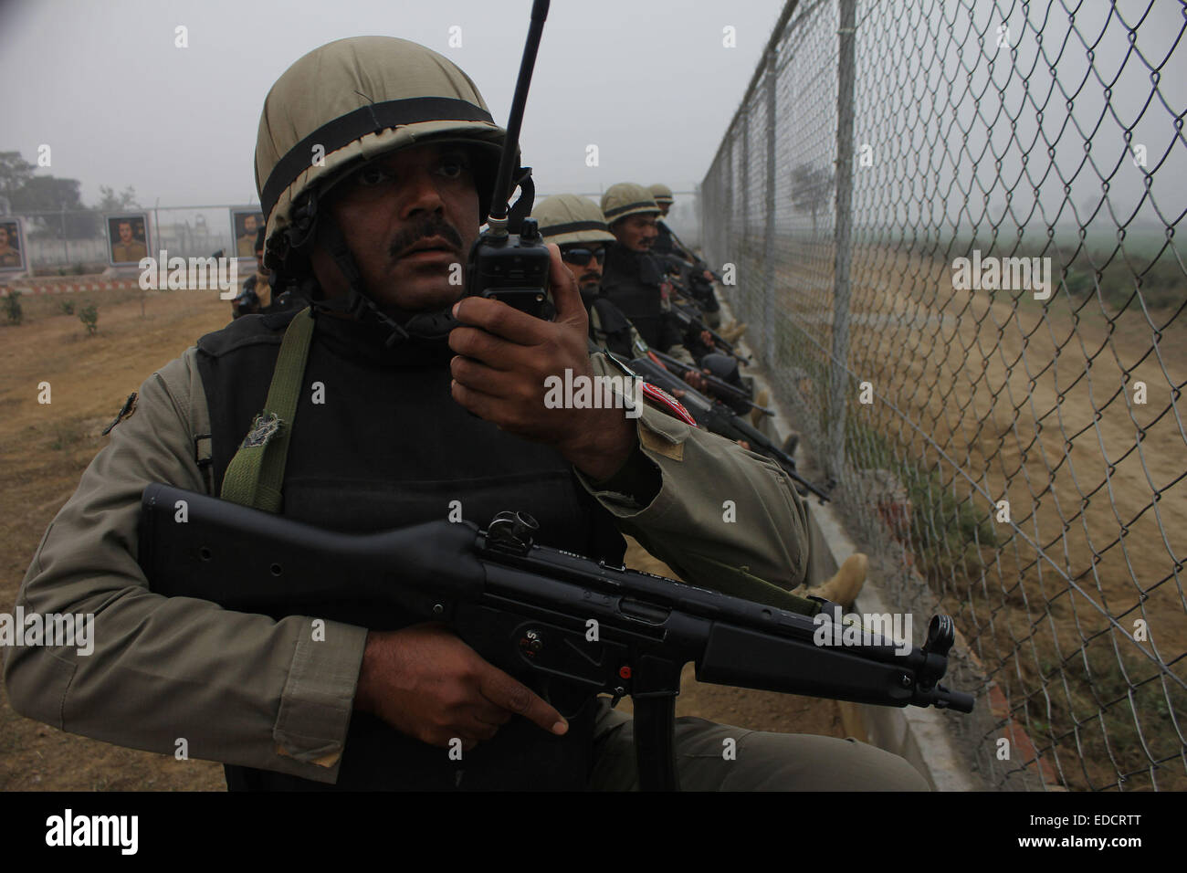 Pakistani Security Force patrol along the Pakistan-India border area of ...