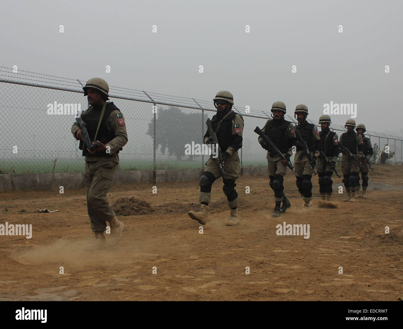 Pakistani Security Force patrol along the Pakistan-India border area of ...