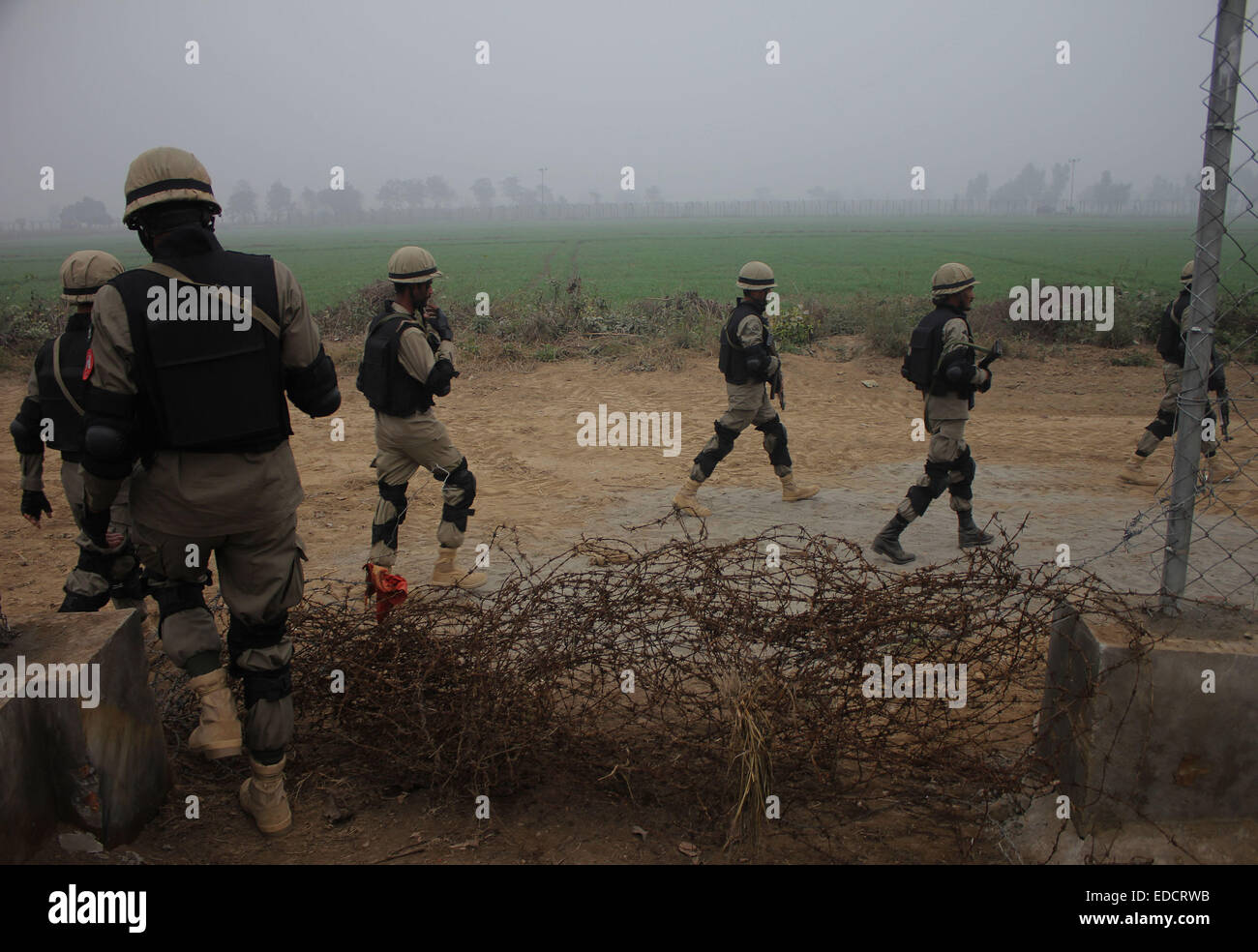 Pakistani Security Force patrol along the Pakistan-India border area of ...