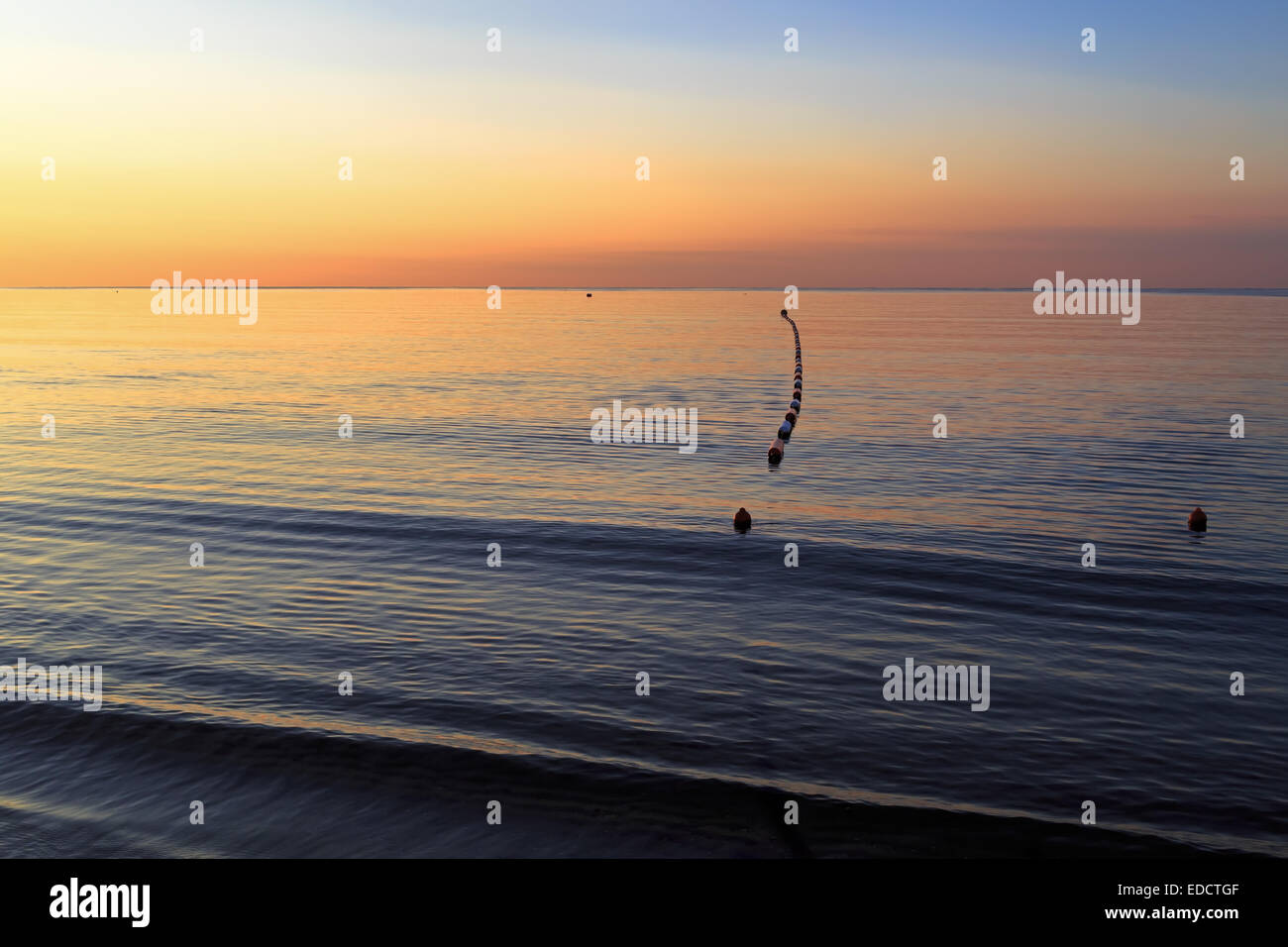 Bright colorful sunrise over the sea. Horizontal shot Stock Photo - Alamy