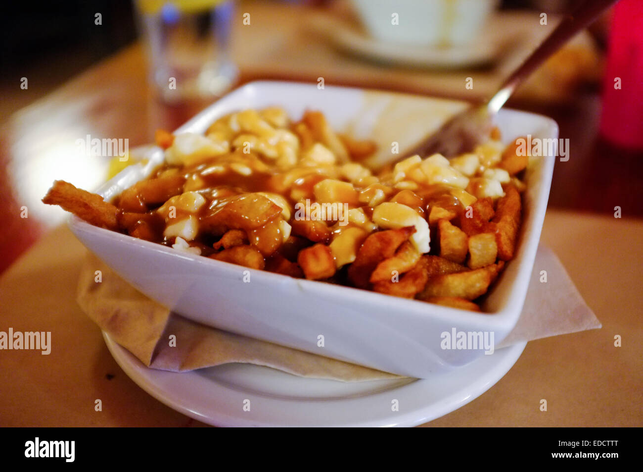 A poutine from Frite Alors in Montreal, Quebec Stock Photo - Alamy