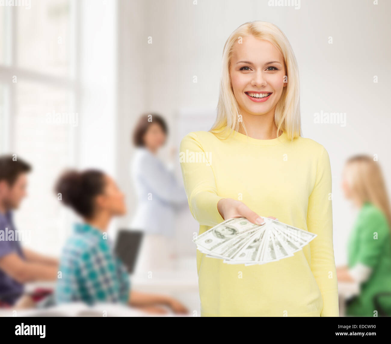 smiling girl with dollar cash money Stock Photo - Alamy