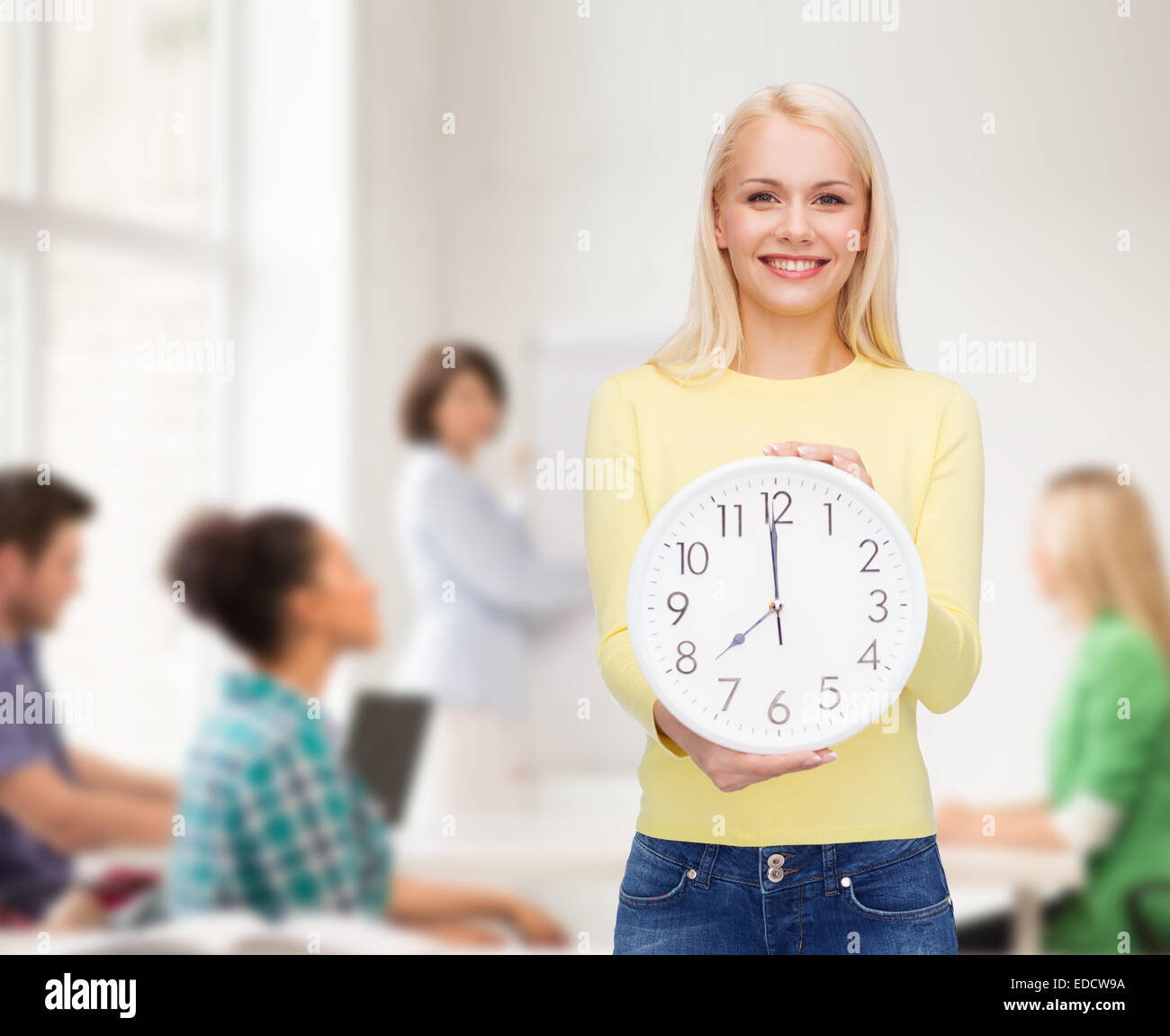 student with wall clock Stock Photo - Alamy