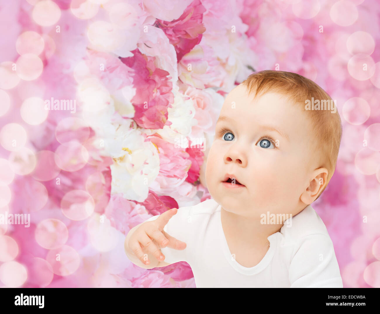 curious baby looking up Stock Photo - Alamy