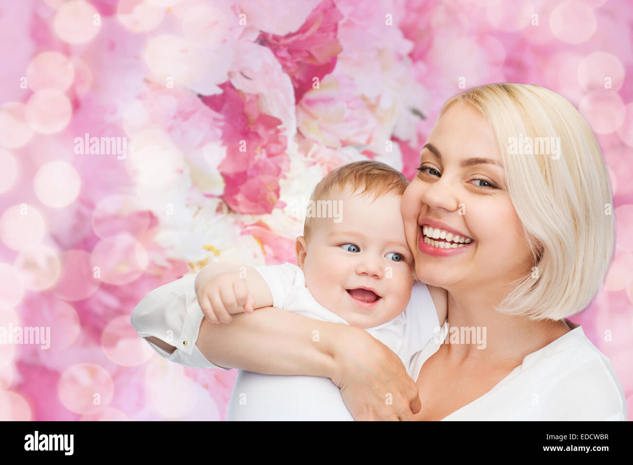 happy mother with smiling baby Stock Photo - Alamy
