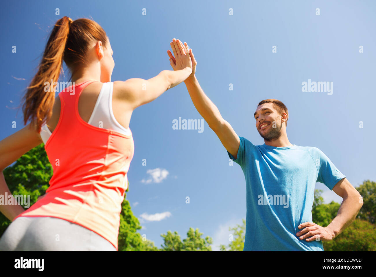 Making high five two hi-res stock photography and images - Alamy
